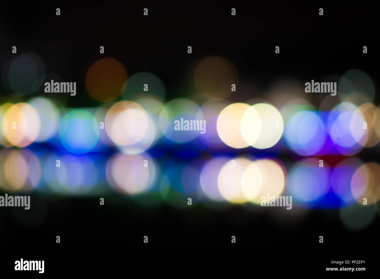 Abstract city street light defocused at night, blur bokeh, colorful & dark background Stock ...