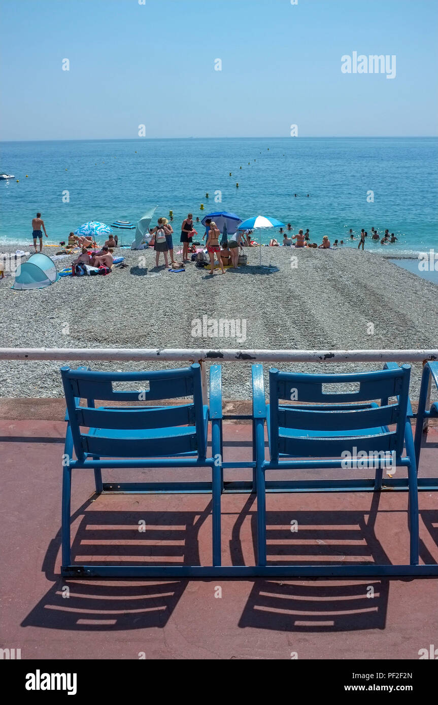 Blue chairs on the Promenade Des Anglais in Nice France Stock Photo - Alamy