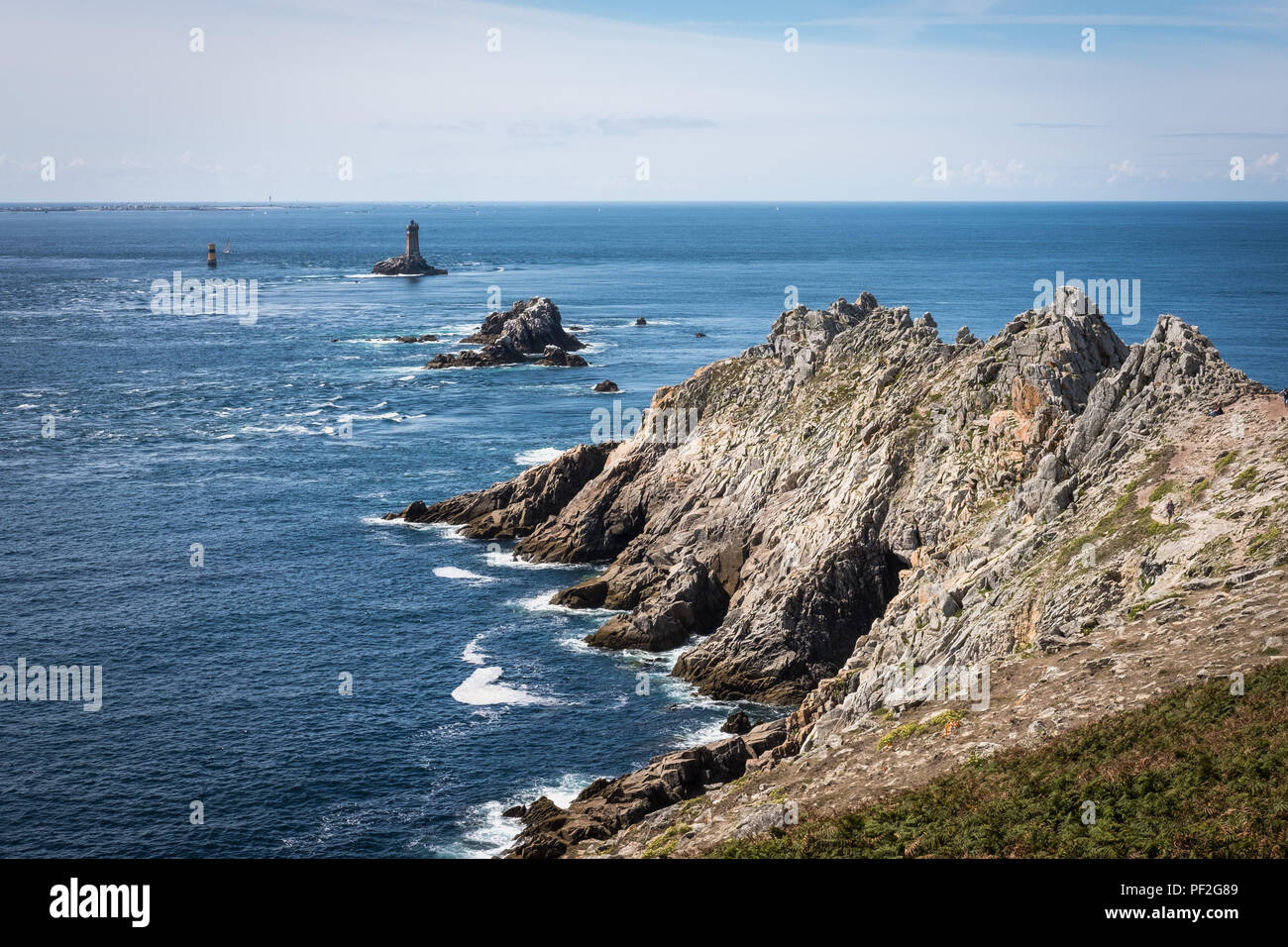 View of the vieille lighthouse and the cliffs at the tip of the raz in ...