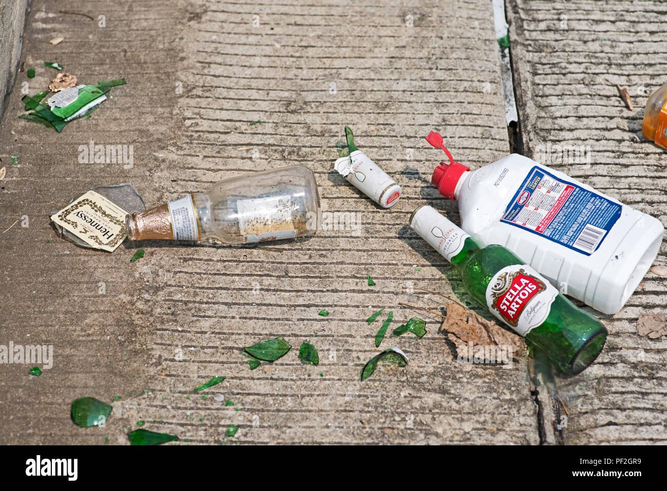 Waste management concept. Coastal pollution. Garbage on concrete ...