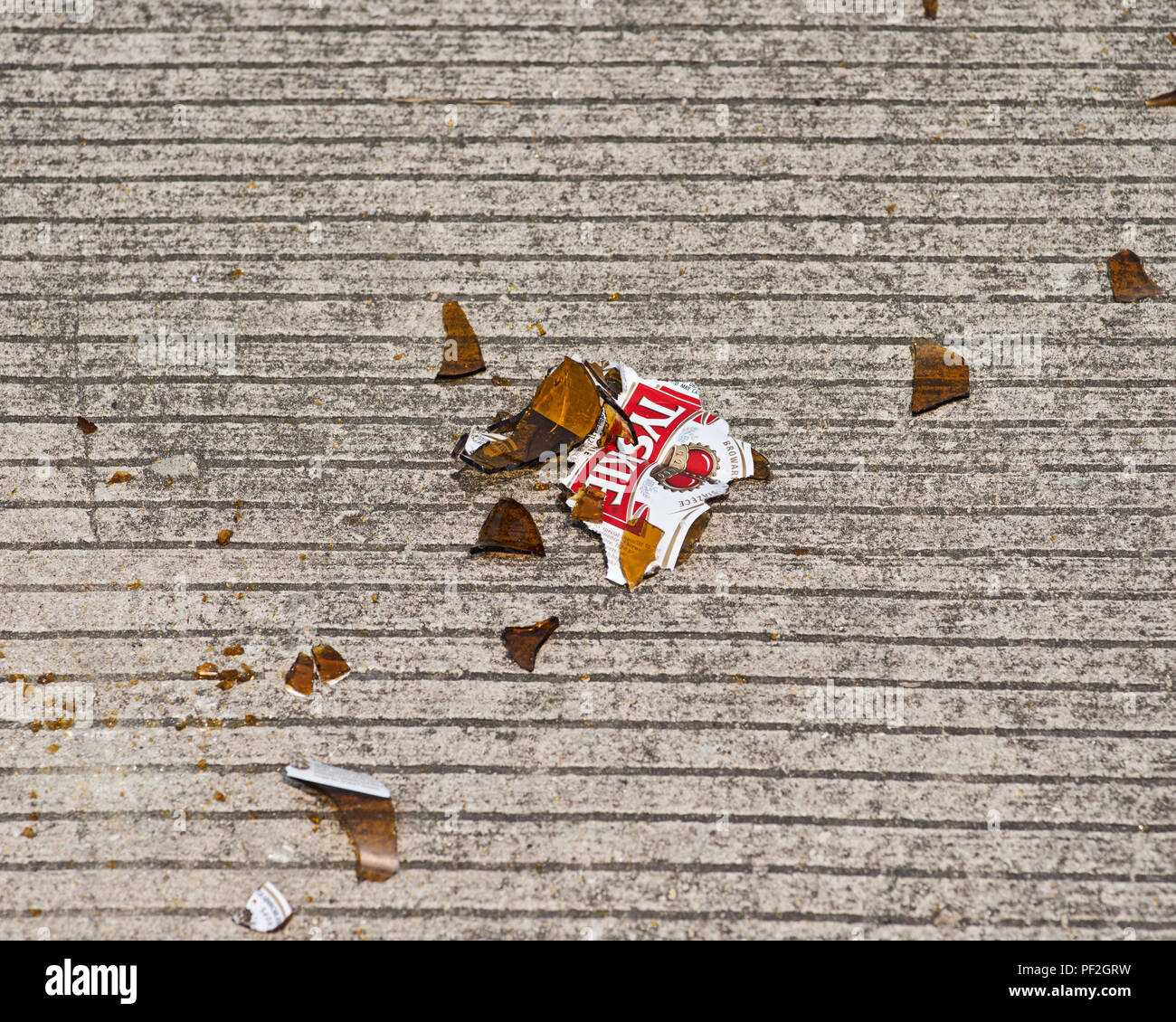 Waste management concept. Coastal pollution. Garbage on concrete ...