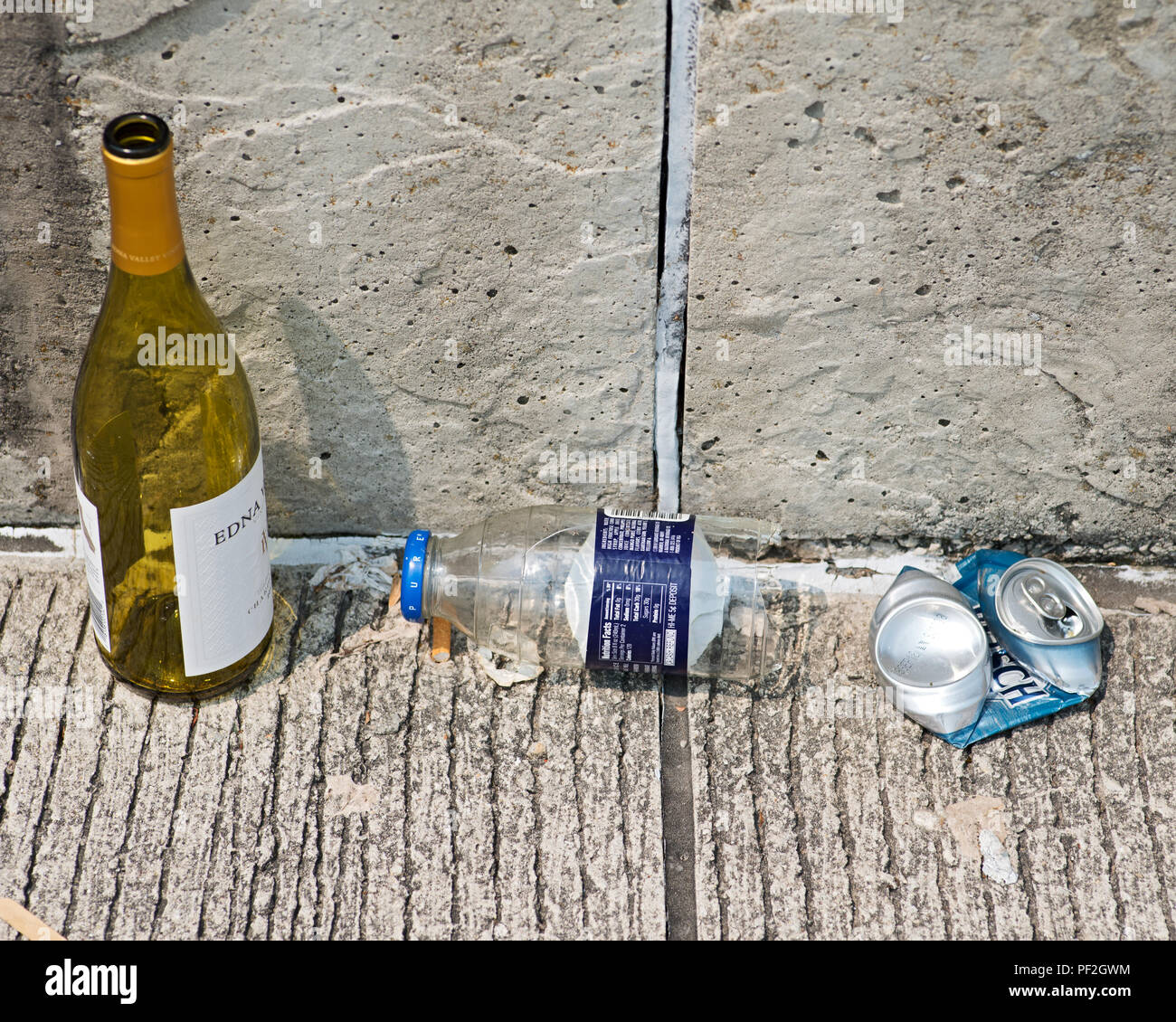 Waste management concept. Coastal pollution. Garbage on concrete ...