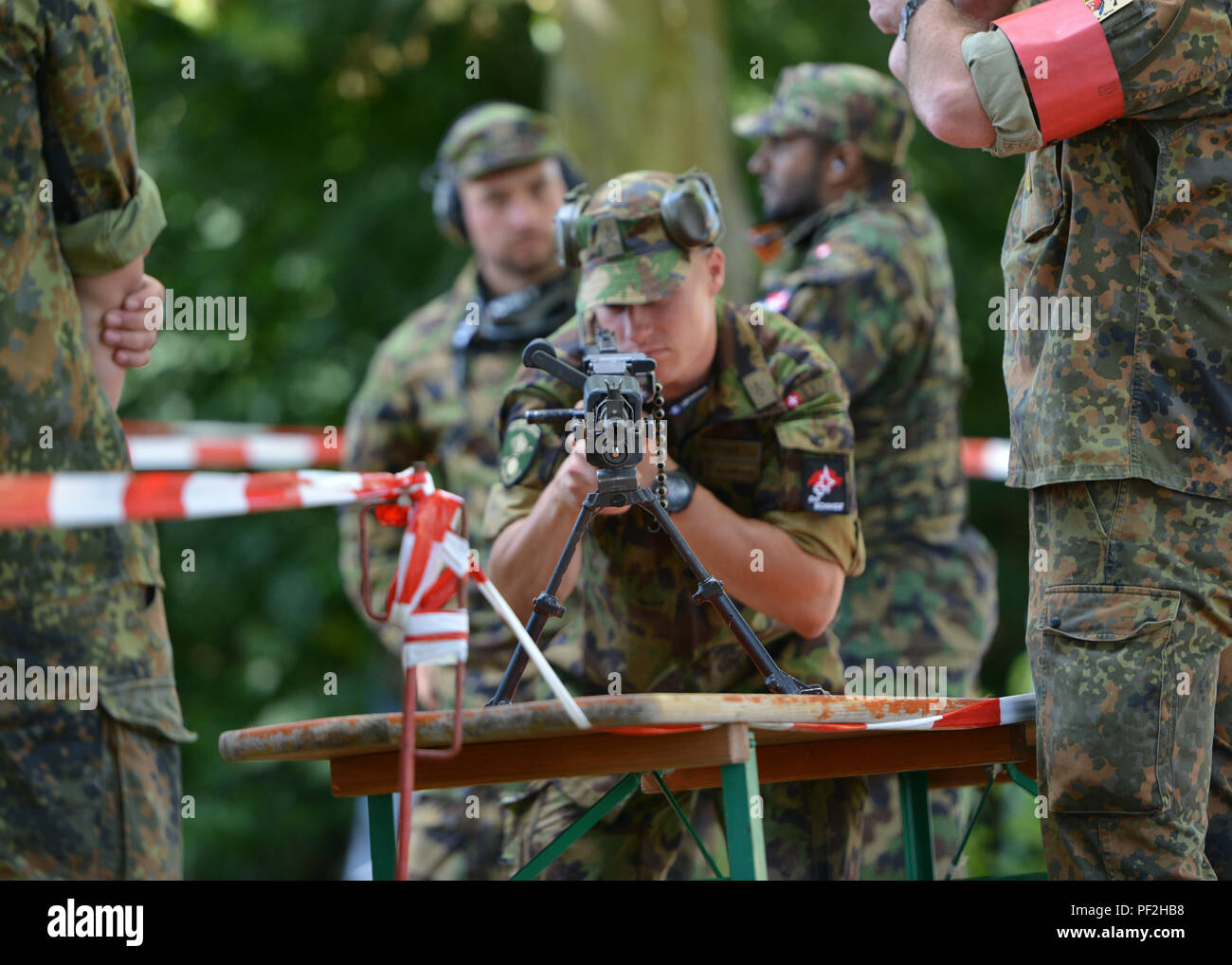 A participant in the Monti-Kali Shooting Competition practices safety ...