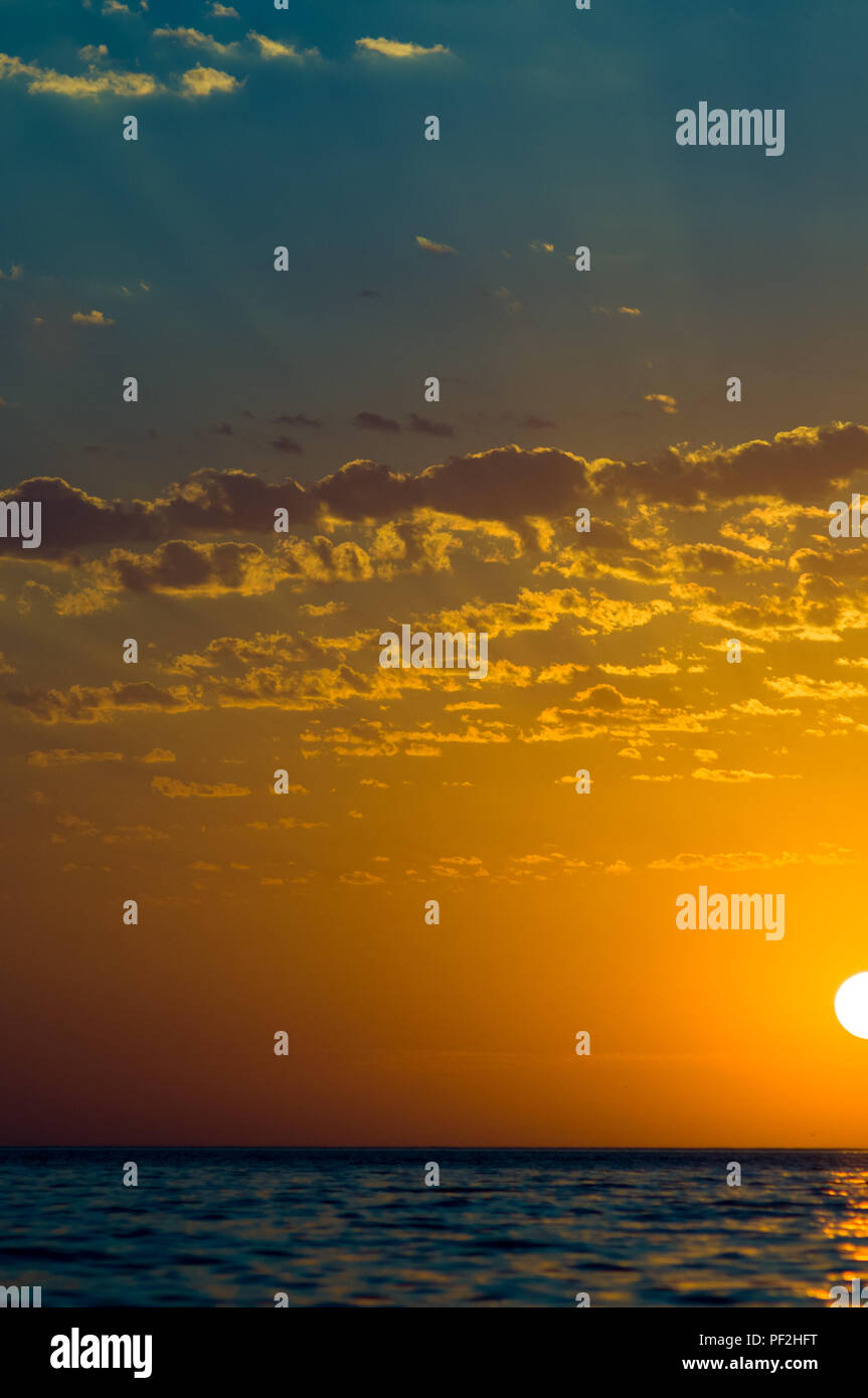 Summer sea sunset, the sun, waves and clouds, beautiful dramatic ...