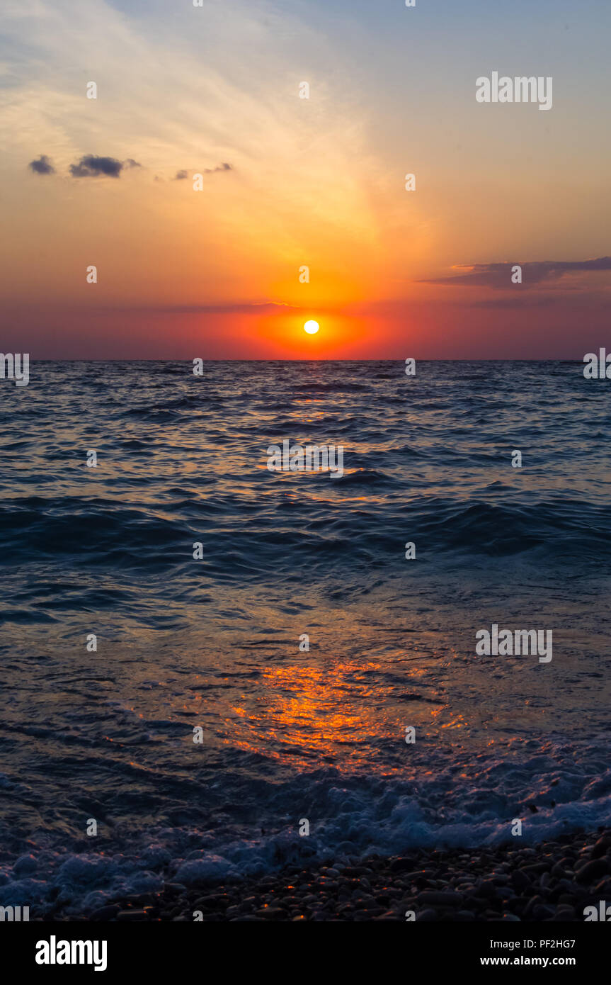 Summer sea sunset, the sun, waves and clouds, beautiful dramatic ...