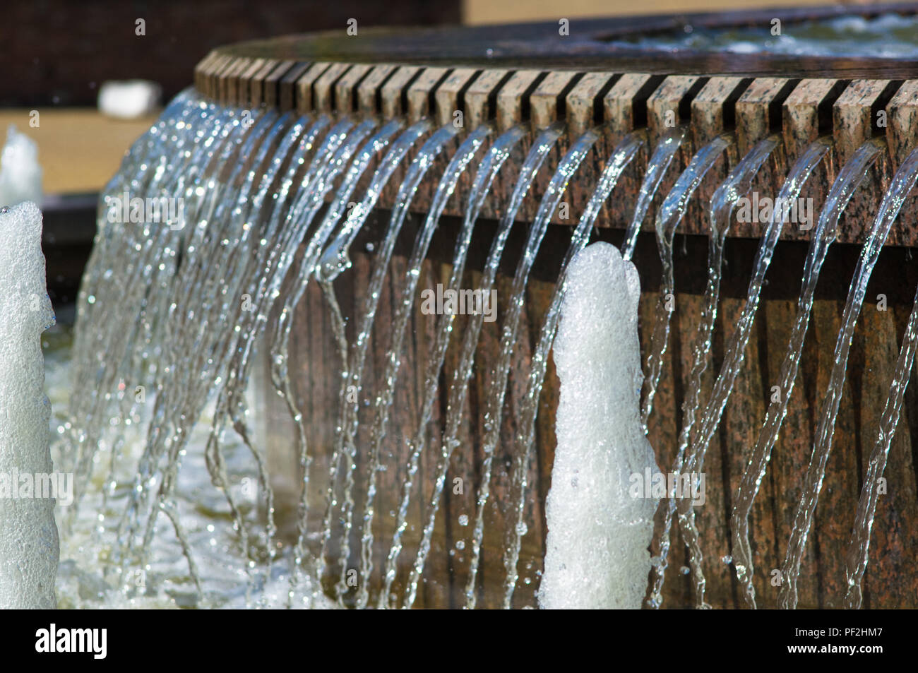 Fountain in city park on hot summer day, beautiful bright streams of ...