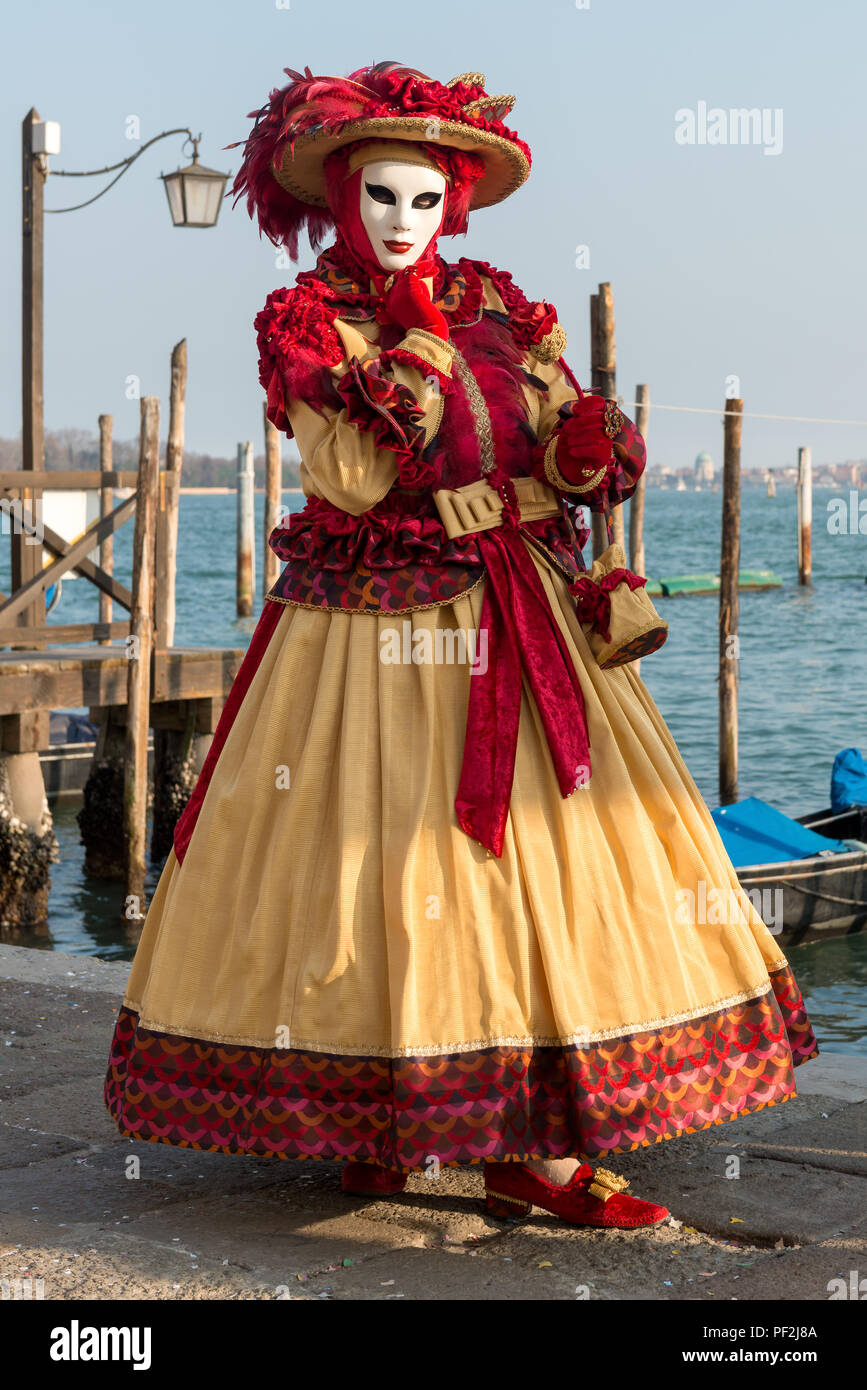 Reveller In Traditional Elaborate Mask And Costume At Venice Carnival ...
