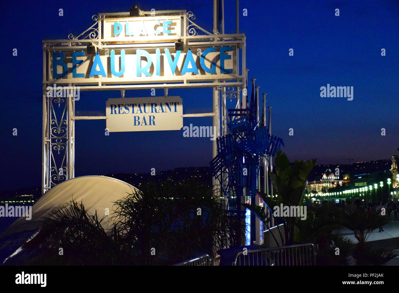 The Beau Rivage private beach sign at night on the Promenade des ...