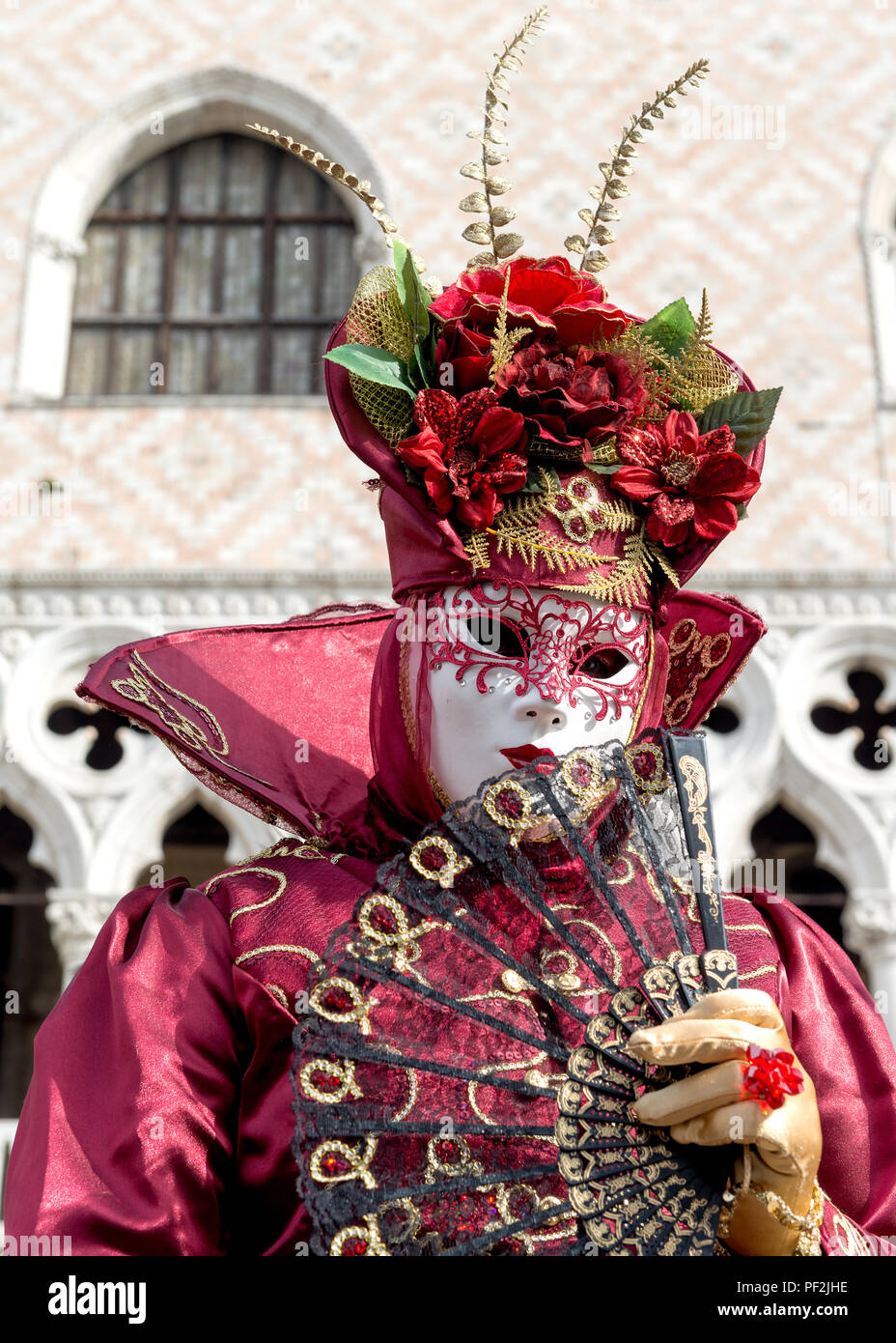 Reveller In Traditional Elaborate Mask And Costume At Venice Carnival ...