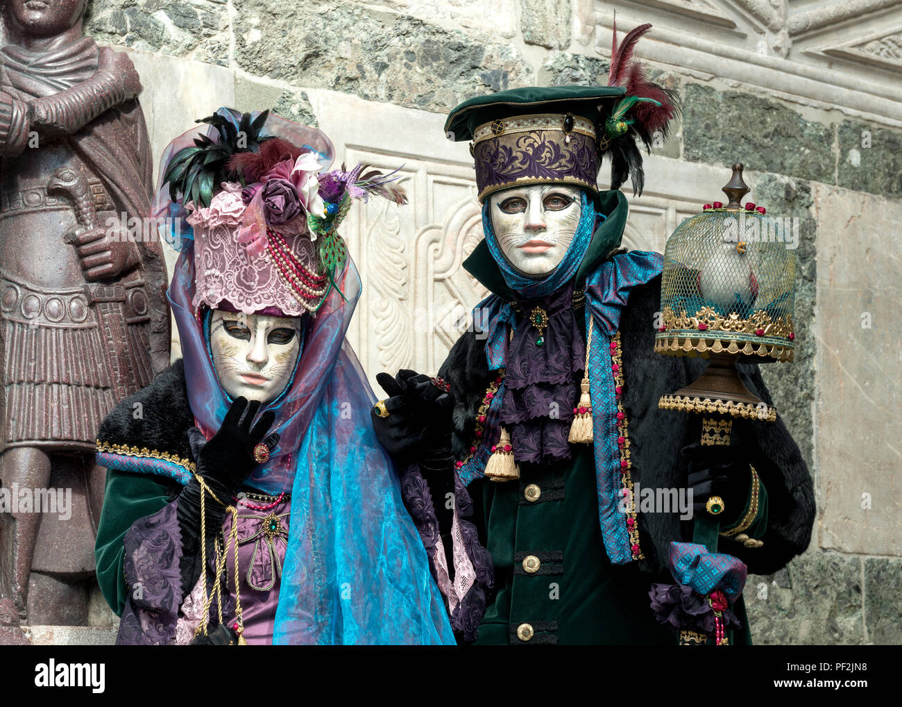 Revellers In Traditional Elaborate Mask And Costume At Venice Carnival ...