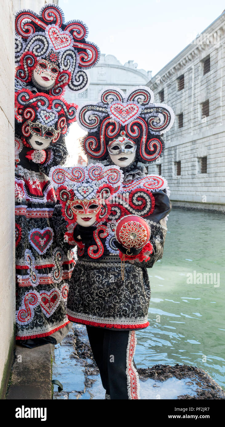 Revellers In Traditional Elaborate Mask And Costume At Venice Carnival ...