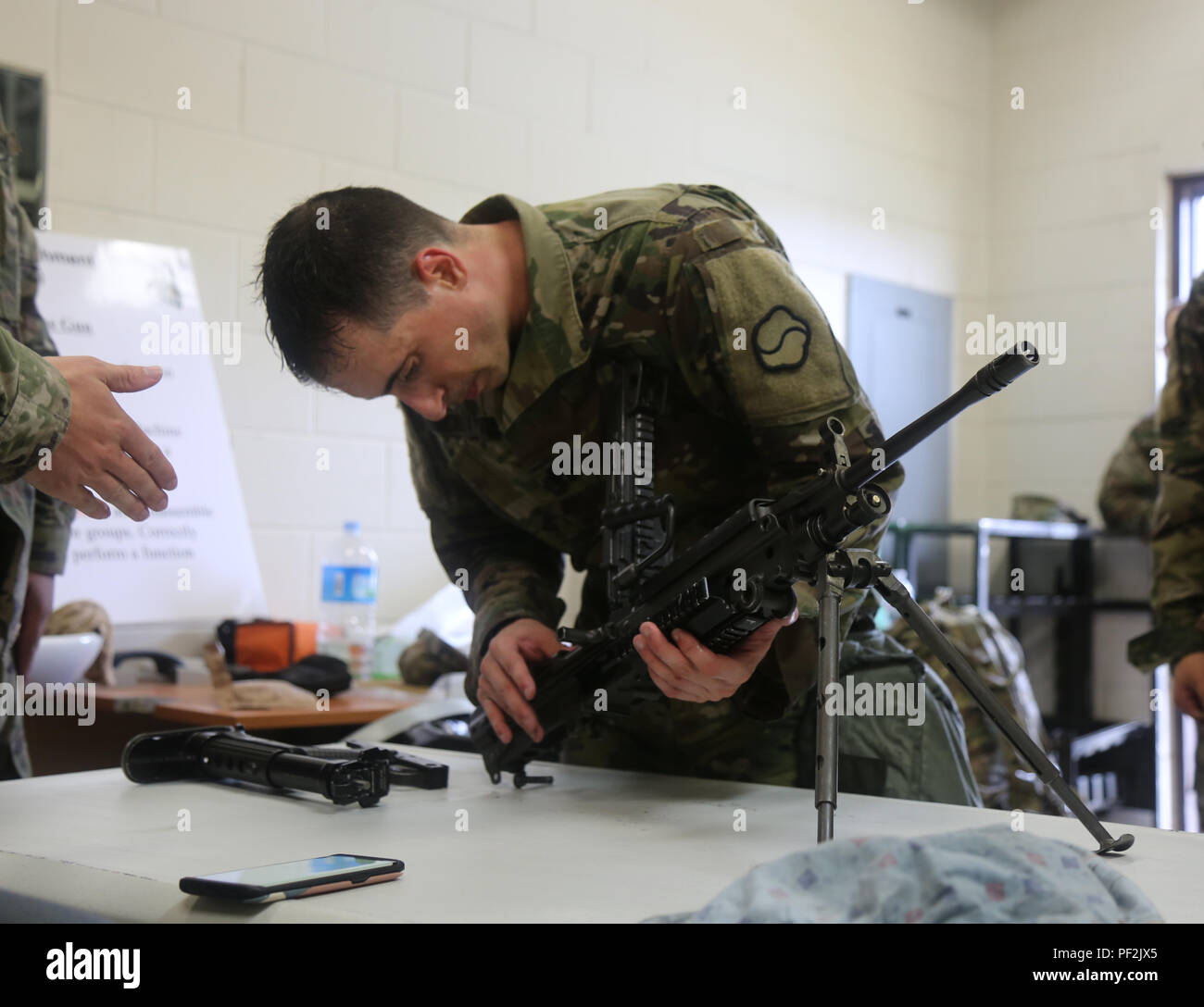 The commander of the 665th Movement Control Team, 25th Transportation ...