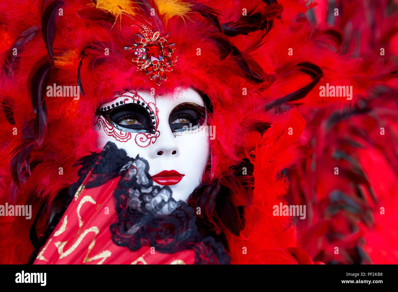 Reveller In Traditional Elaborate Mask And Costume At Venice Carnival ...