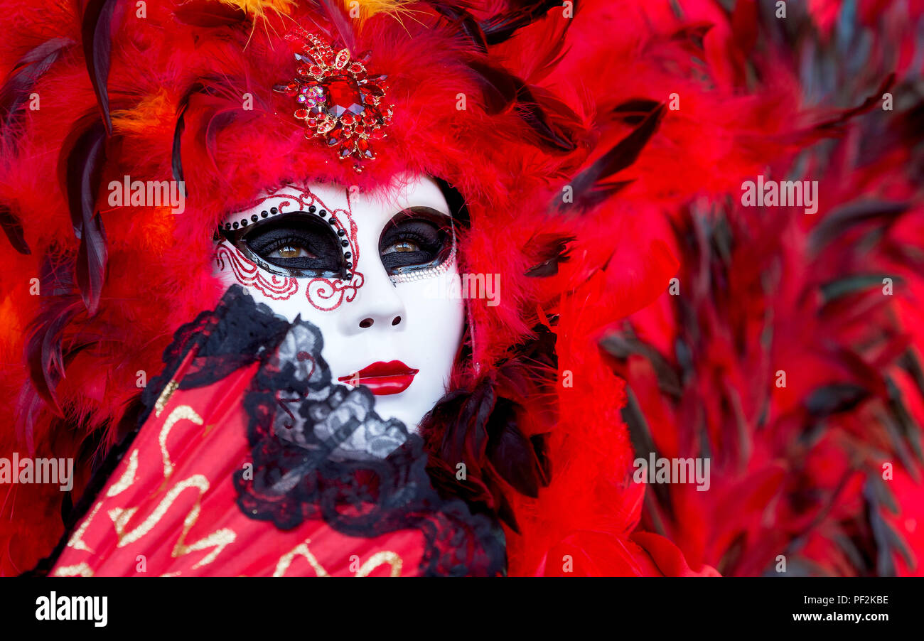 Reveller In Traditional Elaborate Mask And Costume At Venice Carnival ...