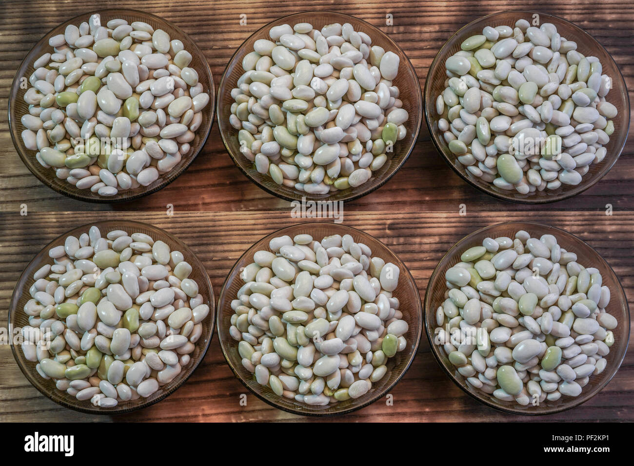 Beans in vitreous stained glass are exposed in a healthy food store ...