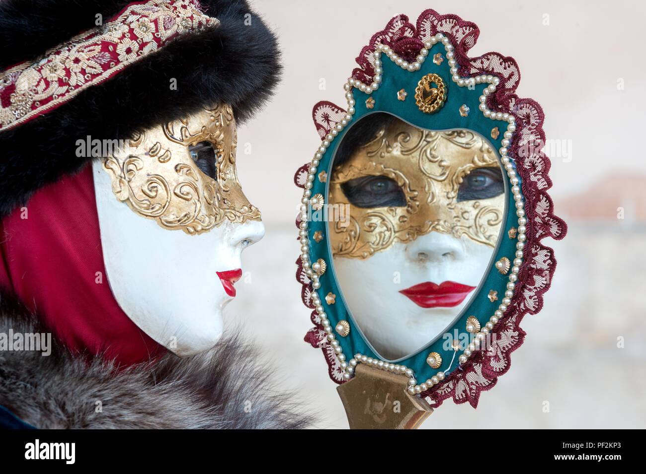 Reveller In Traditional Elaborate Mask And Costume At Venice Carnival ...