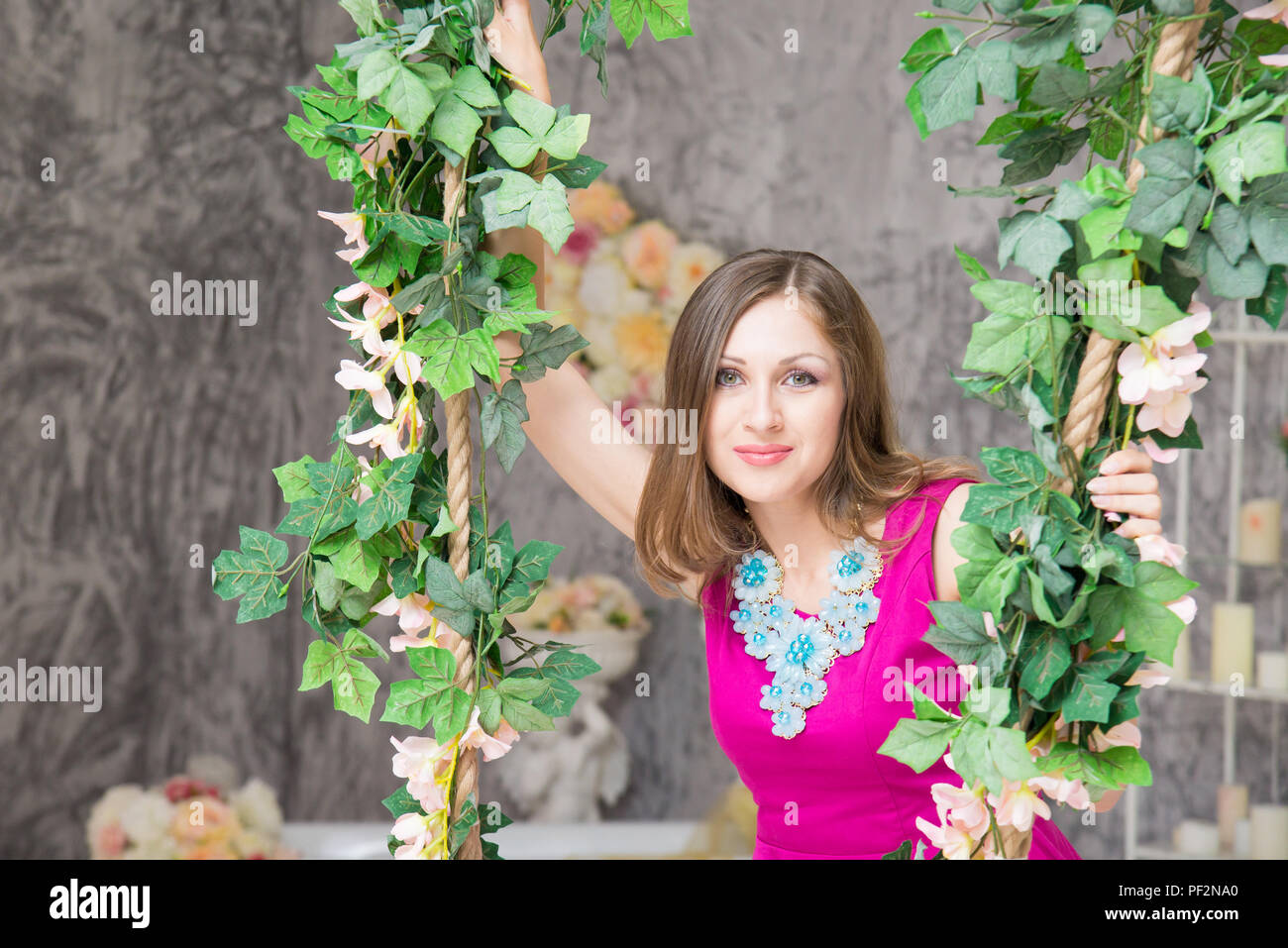 pretty girl at a photo shoot in the studio Stock Photo - Alamy
