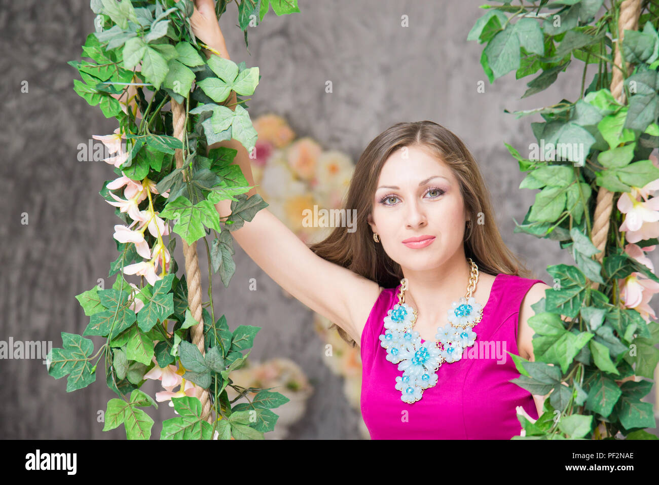 pretty girl at a photo shoot in the studio Stock Photo - Alamy