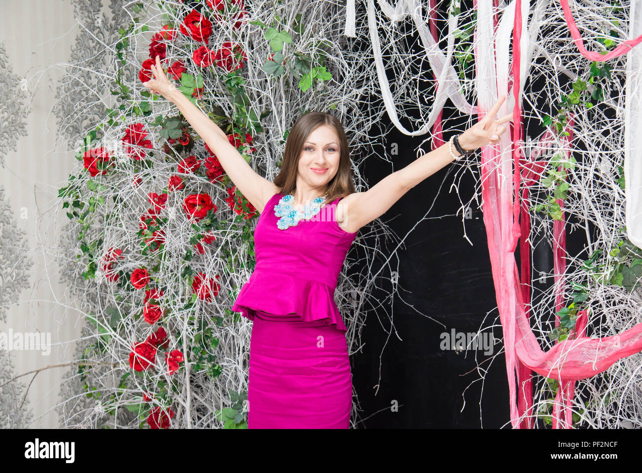 pretty girl at a photo shoot in the studio Stock Photo - Alamy