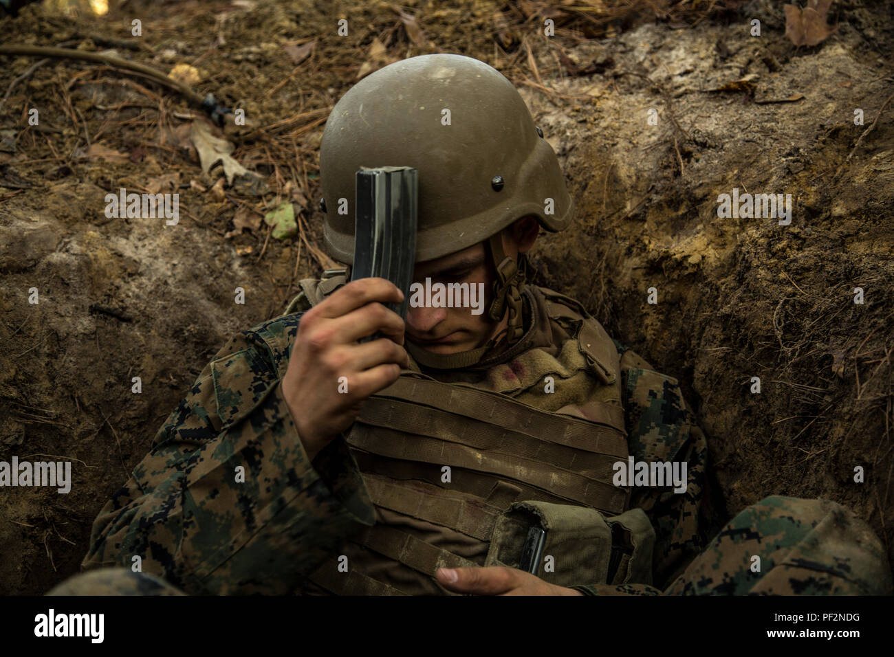 A U.S. Navy Corpsman assigned to Field Medical Training Battalion East ...
