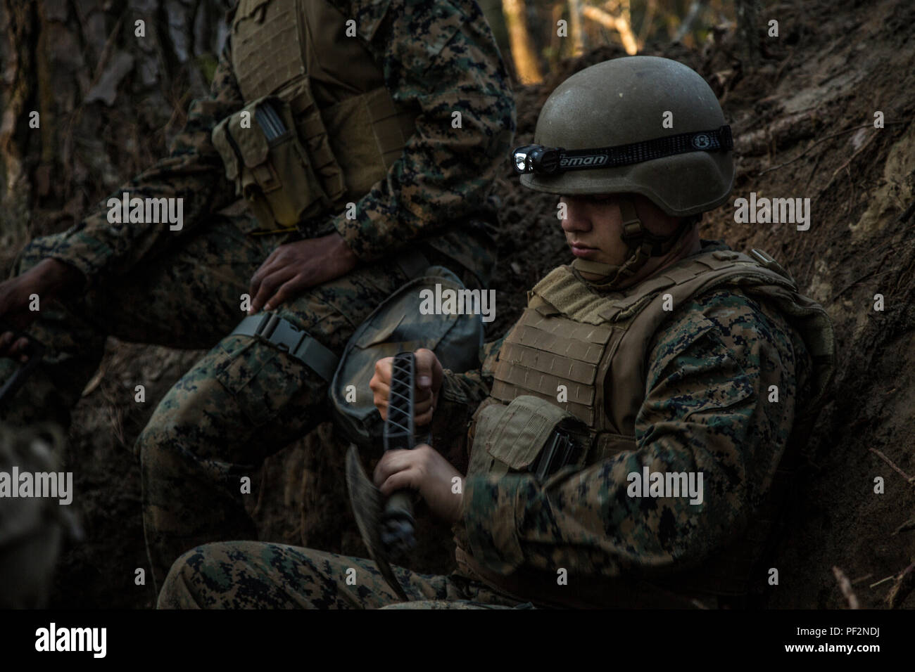 A U.S. Navy Corpsman assigned to Field Medical Training Battalion East ...