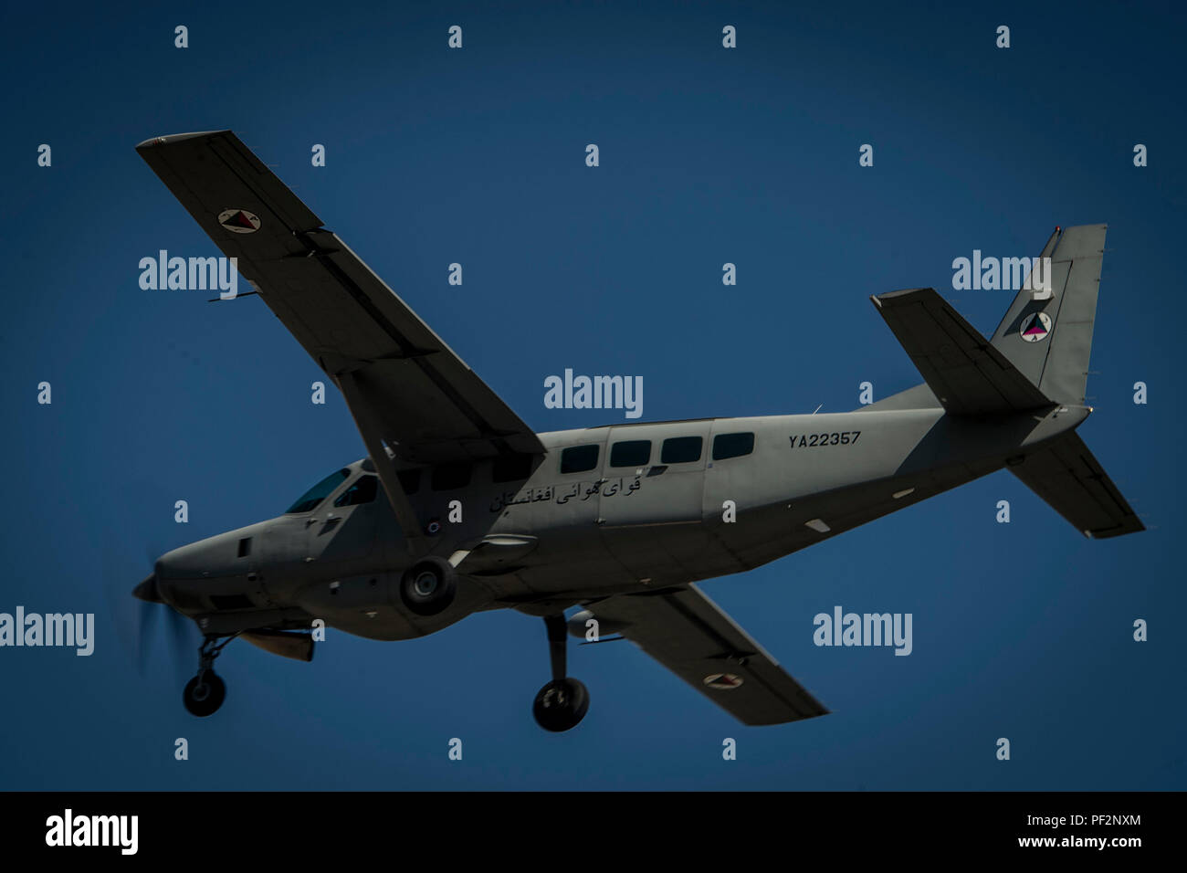 An Afghan Air Force Cessna 208 (C-208) flies over Camp Fenty ...