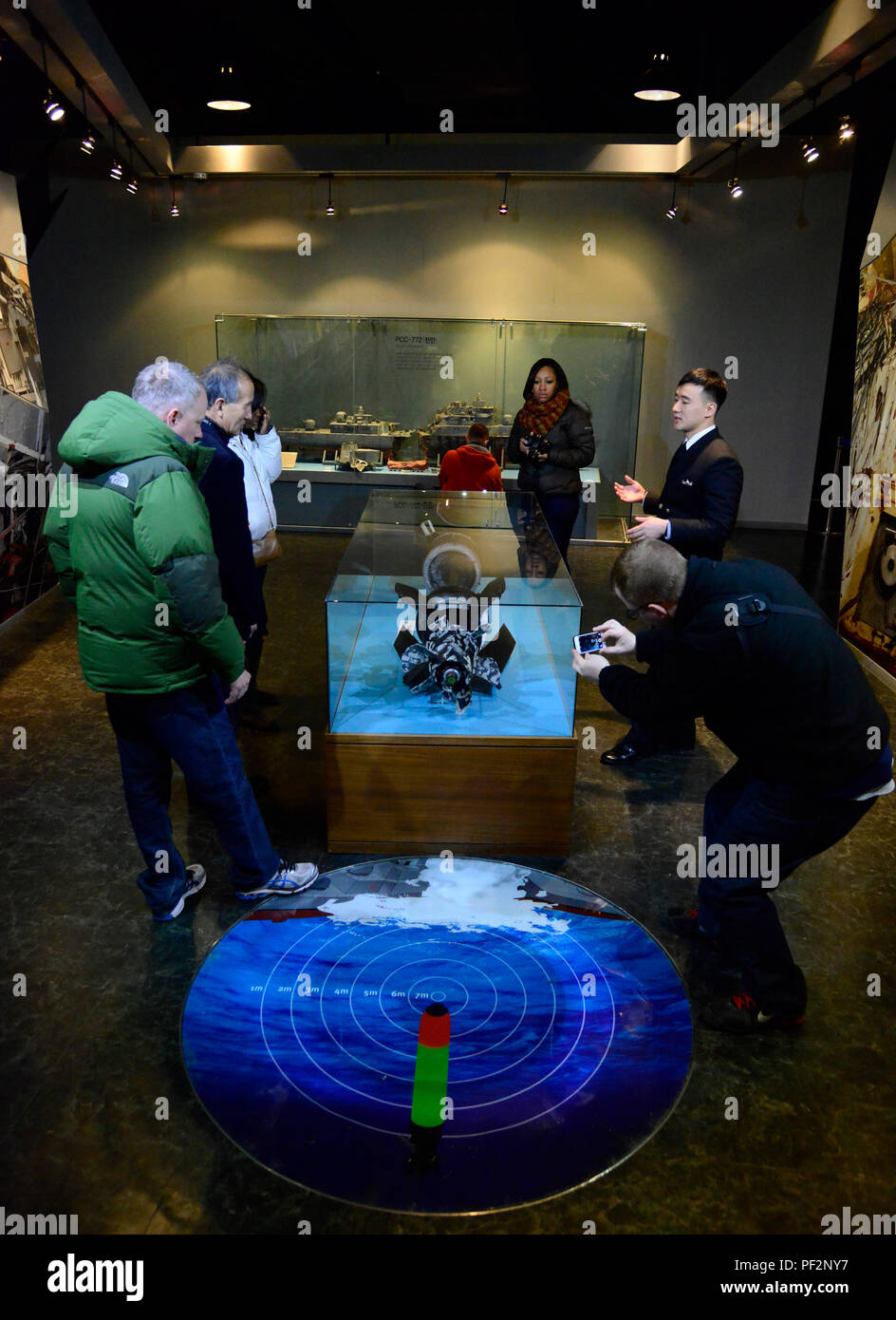 Republic of Korea Navy Petty Officer 1st Class Samuel Jung shows 51st ...