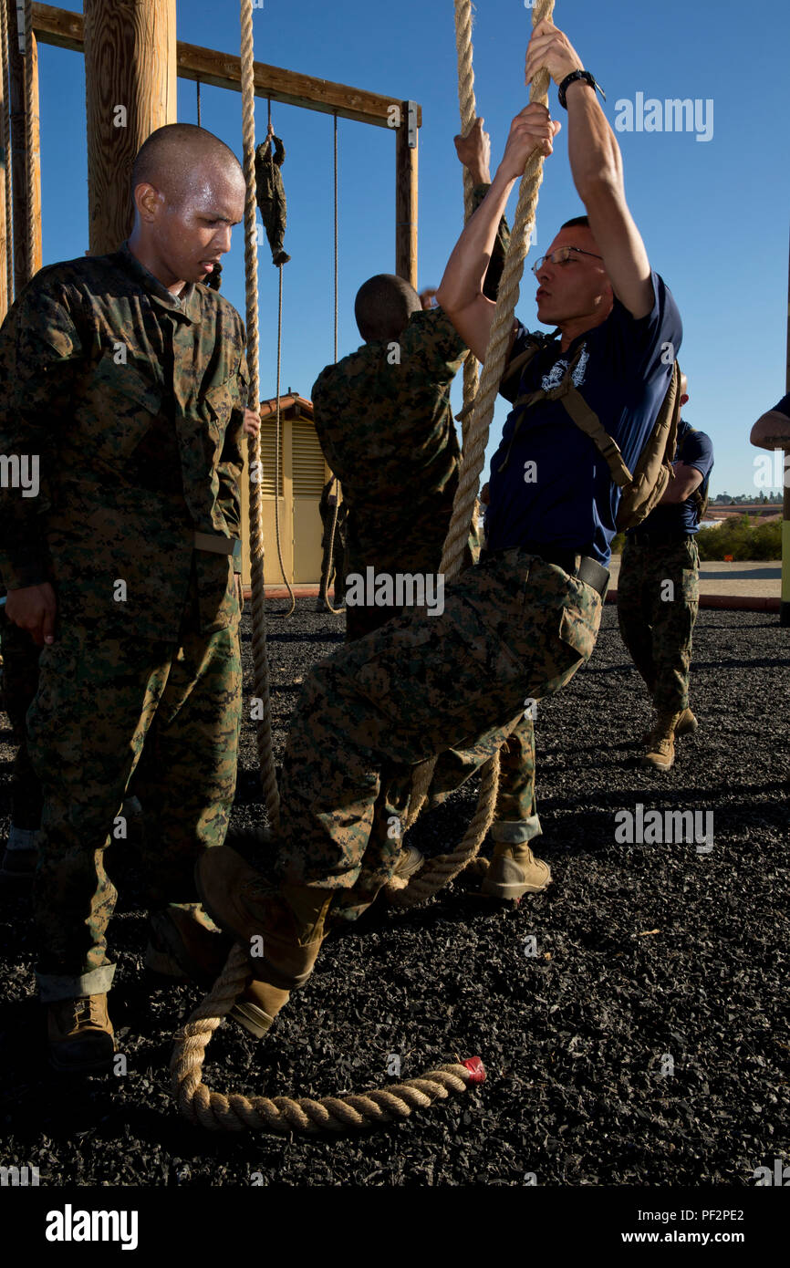 U.S. Marine Corps senior drill instructor Staff Sgt. Marco Torres with ...