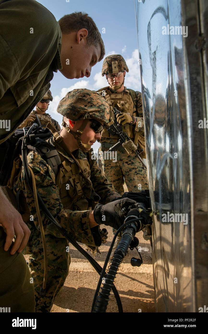 An Israel Defense Force soldier supervises U.S. Marines with Black Sea ...