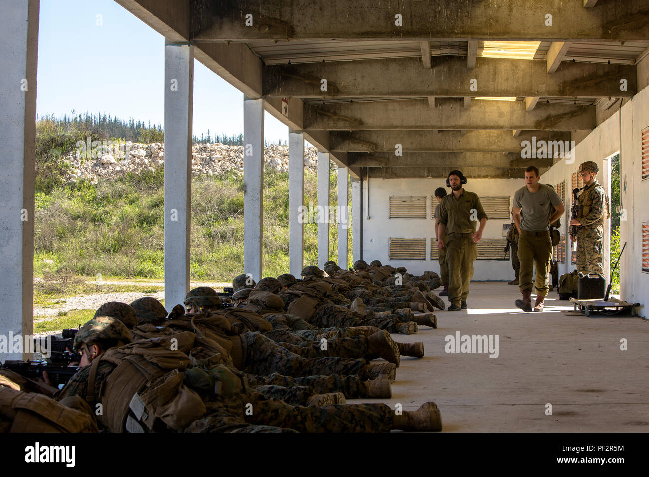 U.S. Marines with Black Sea Rotational Force fire their M4A1 carbines ...