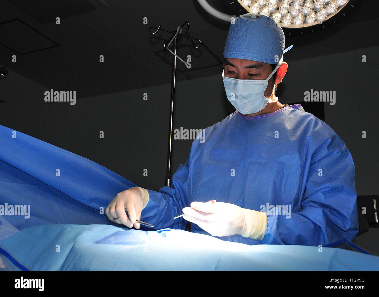 Dr. Mikiro Kato, physician, assigned to U.S. Naval Hospital (USNH ...