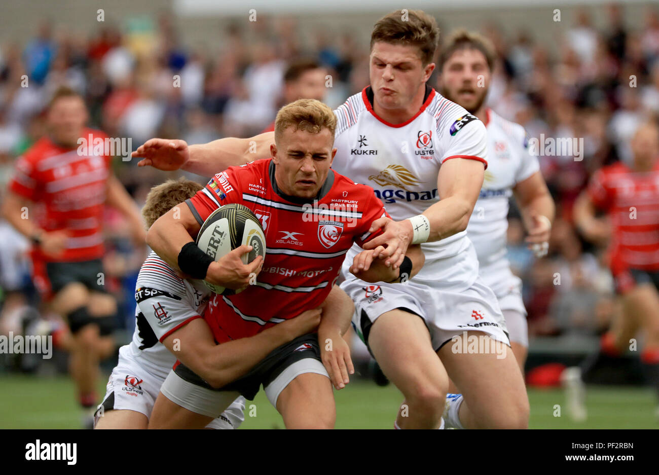 Ben Vellacott of Gloucester tackled Jonny Stewart and Angus Kernohan of ...