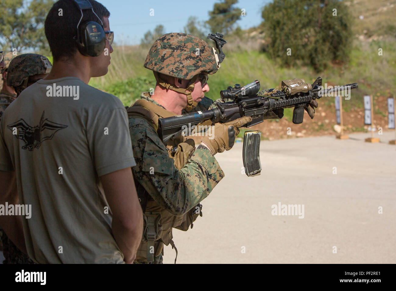 A U.S. Marine with Black Sea Rotational Force releases his magazine ...