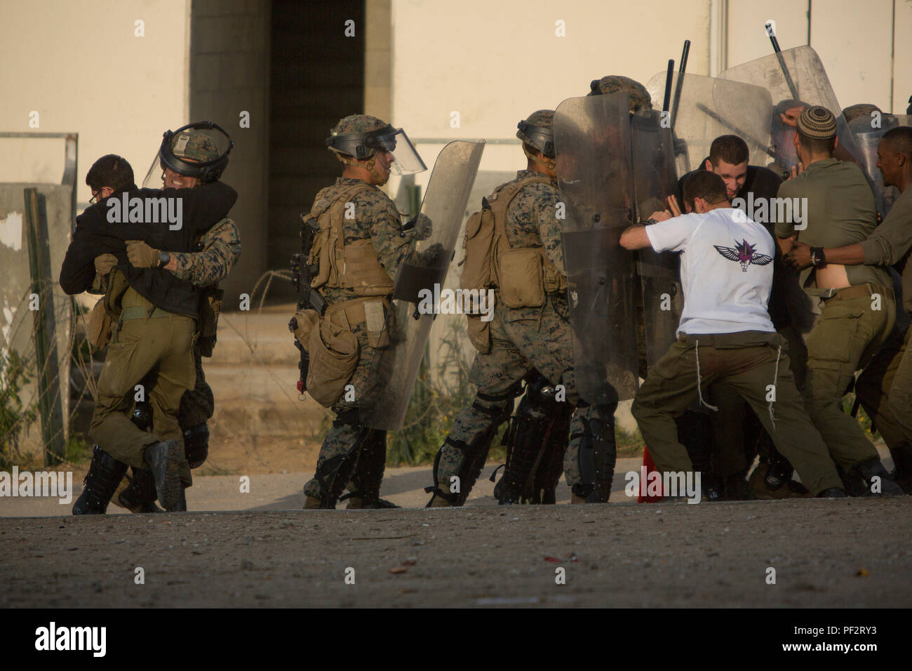 U.S. Marines with Black Sea Rotational Force hold their riot-control ...