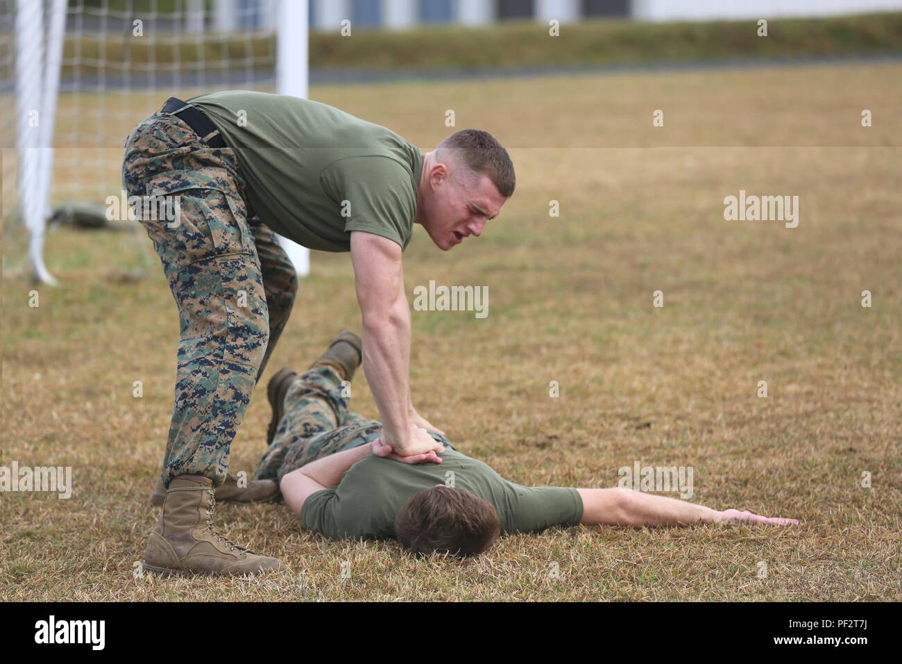 U.S. Marine Corps 1st Lt. Robert F. McCray , left, a platoon commander ...