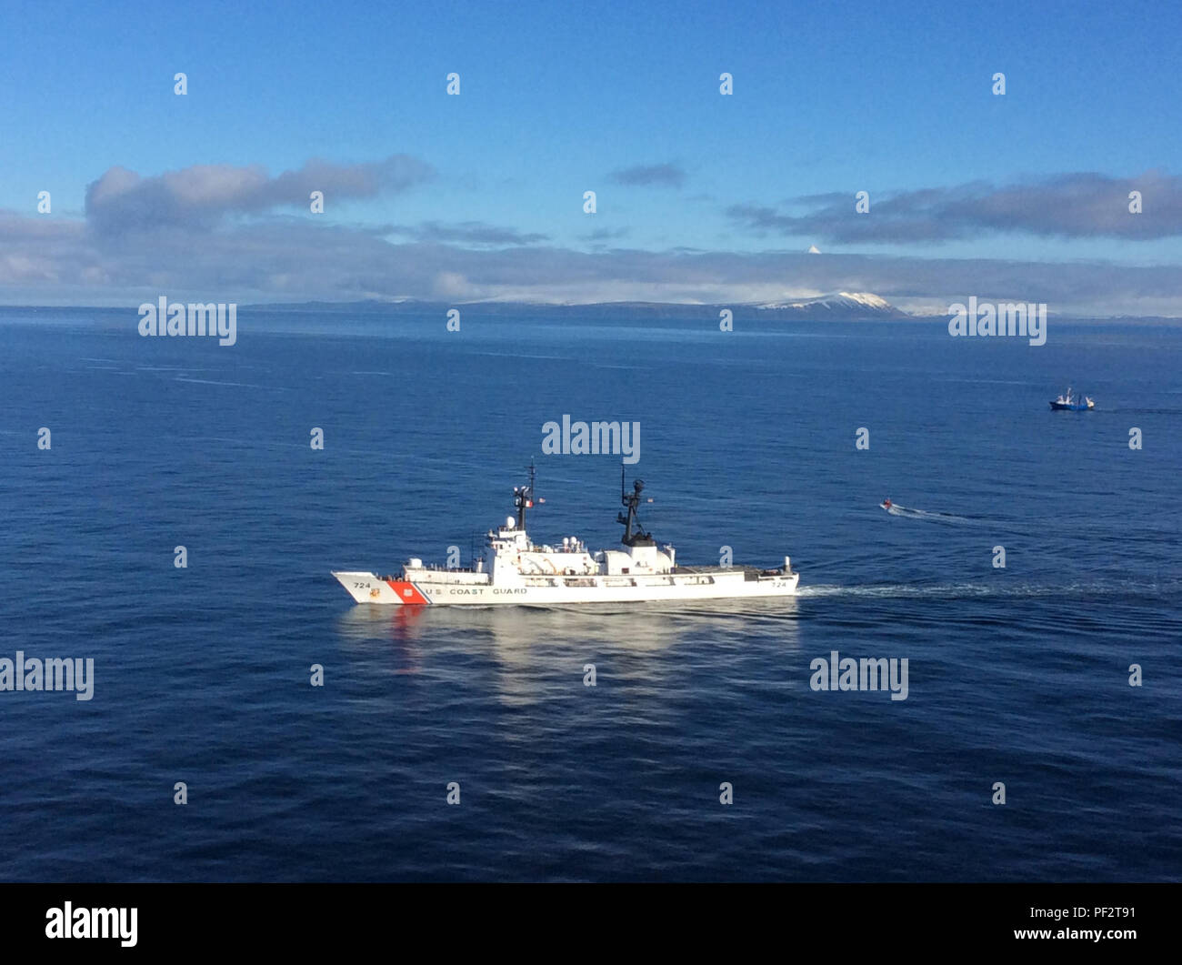 A Coast Guard Cutter Munro boarding team is sent to conduct a vessel ...