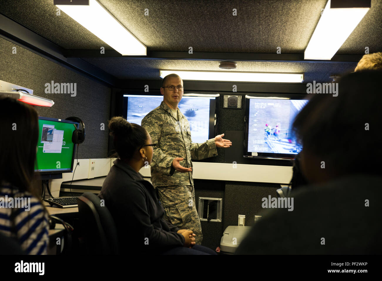 2nd Lt. Andrew Dodd of the 123rd Intelligence Squadron speaks to ...