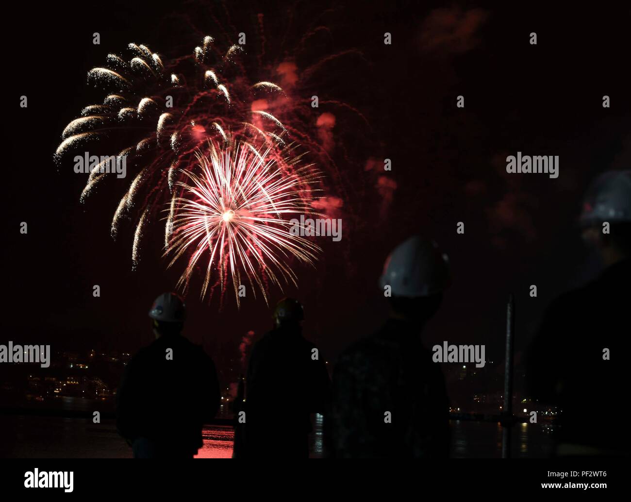 NAVAL BASE KITSAP-BREMERTON, Wash. (July 4, 2016) Sailors observe a ...