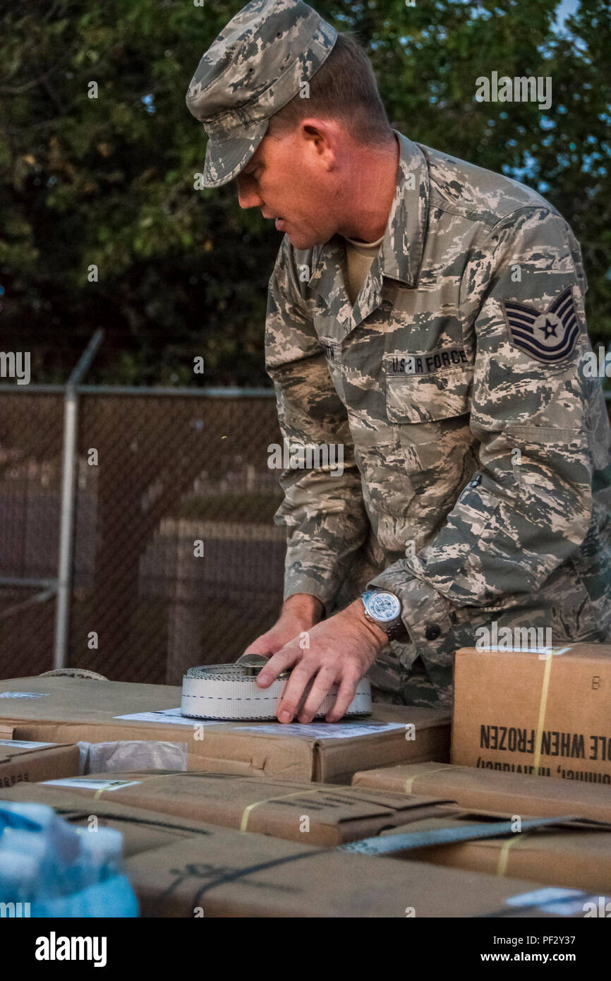 Loading supplies is Tech Sgt. Jason Smith, 140th Logistics Squadron ...