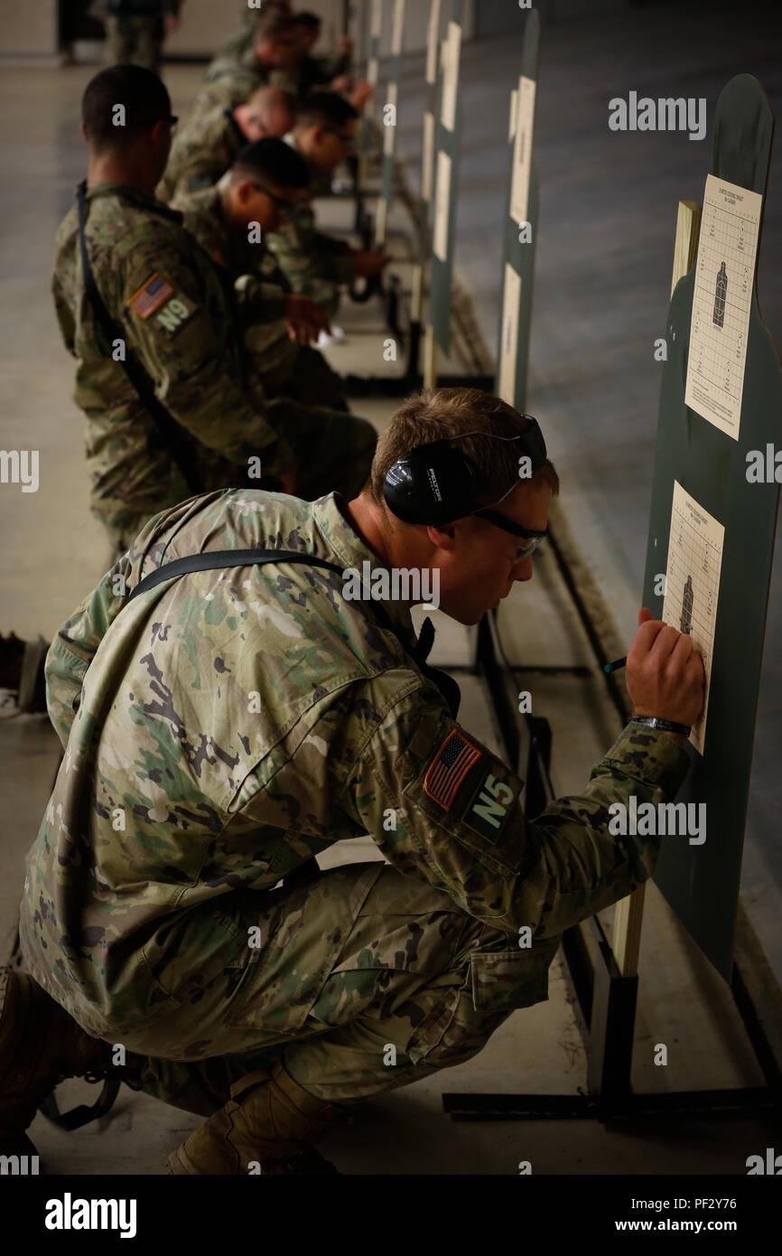 U.S. Army Staff Sgt. Ryan McCarthy, assigned to the U.S. Army Training ...
