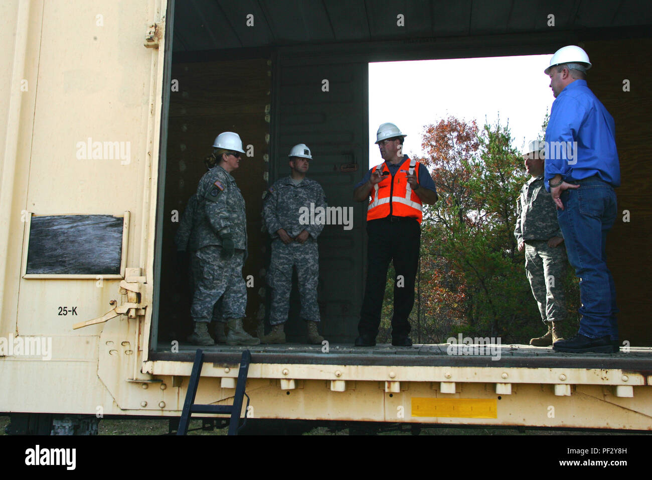 Bob Coulter (center), manager of load and ride solutions with ...