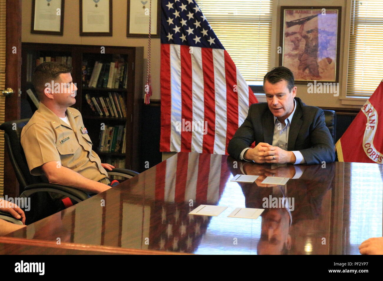 Commanding Officer Major John P. Harley (left) and Senator Todd Young ...