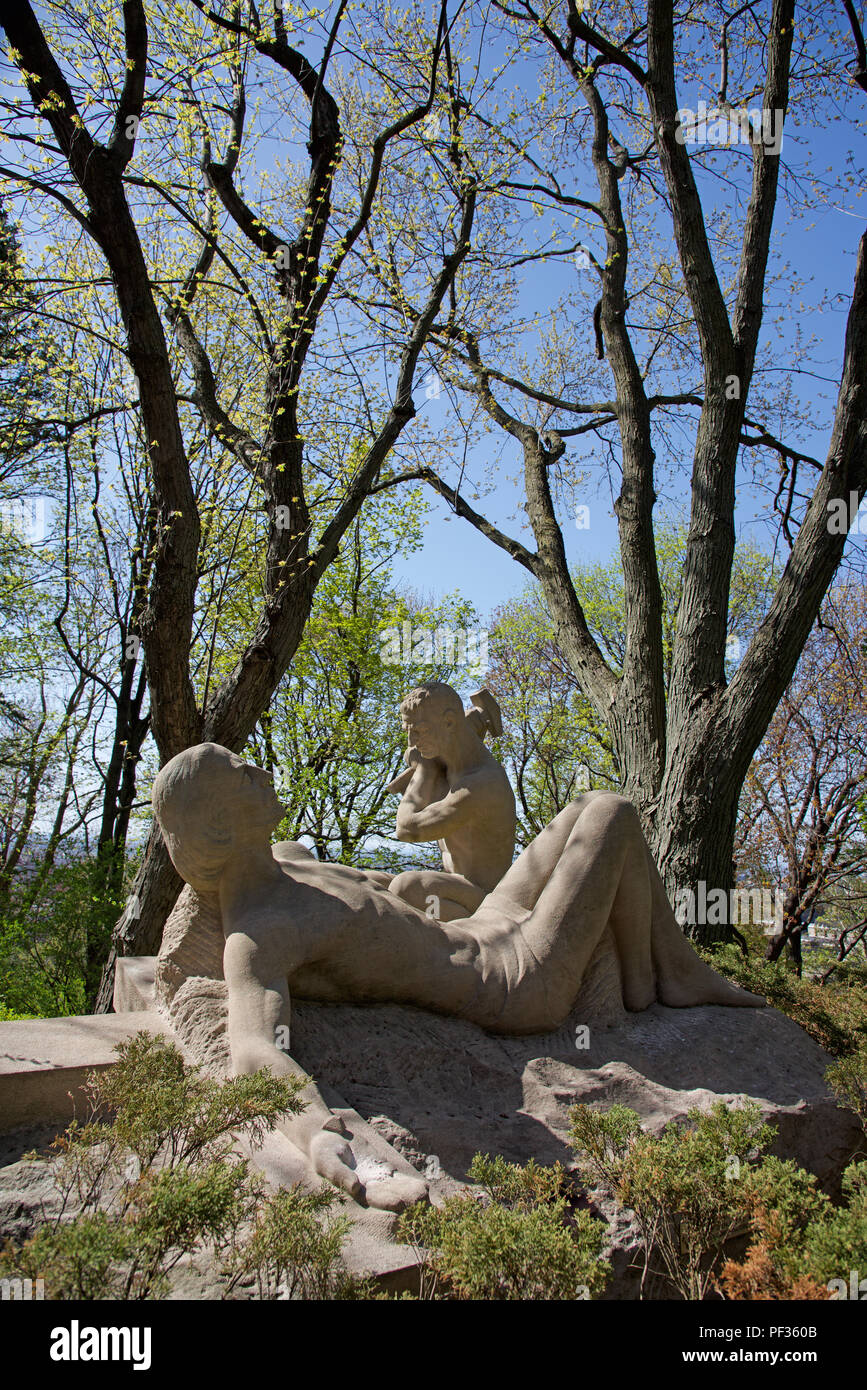 Way of the cross statue of Jesus being nailed to the cross in the upper ...