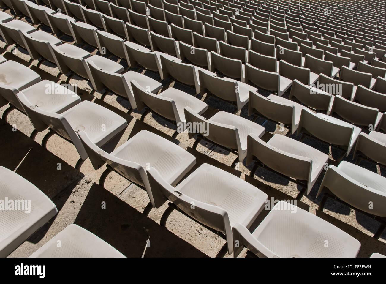 Empty Stadium seats row in a sports stadium Stock Photo - Alamy