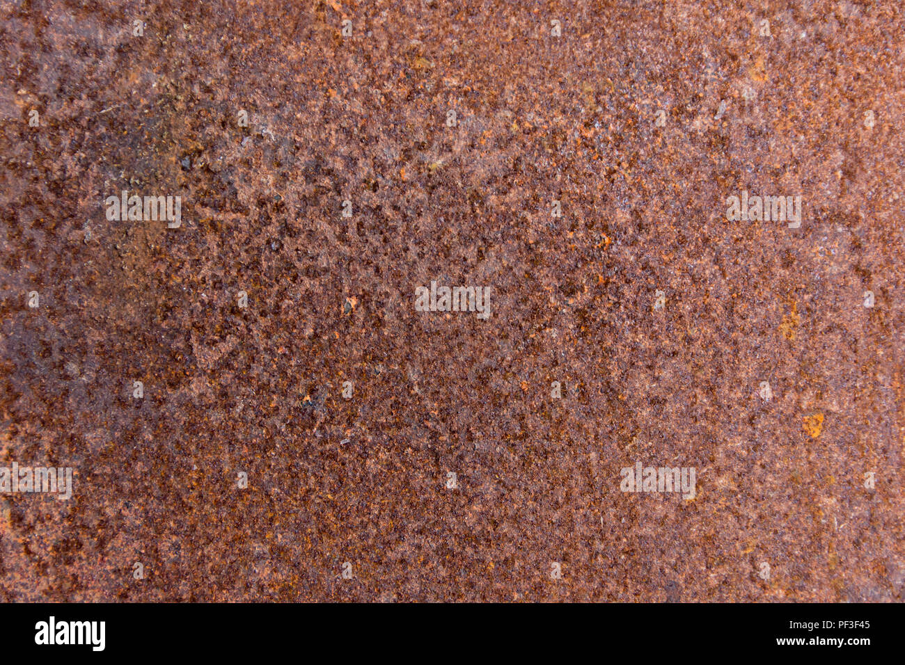 Brown rust stains texture of the old white paint on rusty metal wall ...
