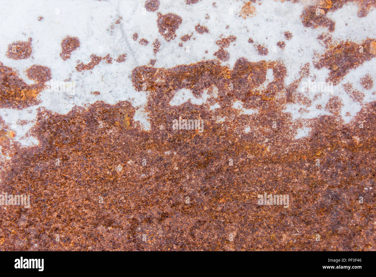 Brown rust stains texture of the old white paint on rusty metal wall ...