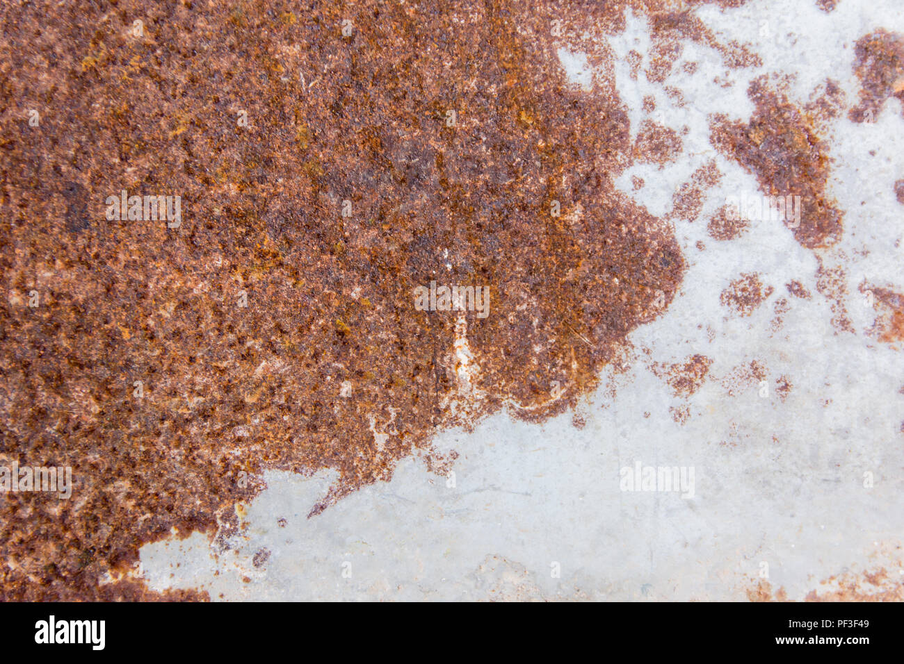 Brown rust stains texture of the old white paint on rusty metal wall ...