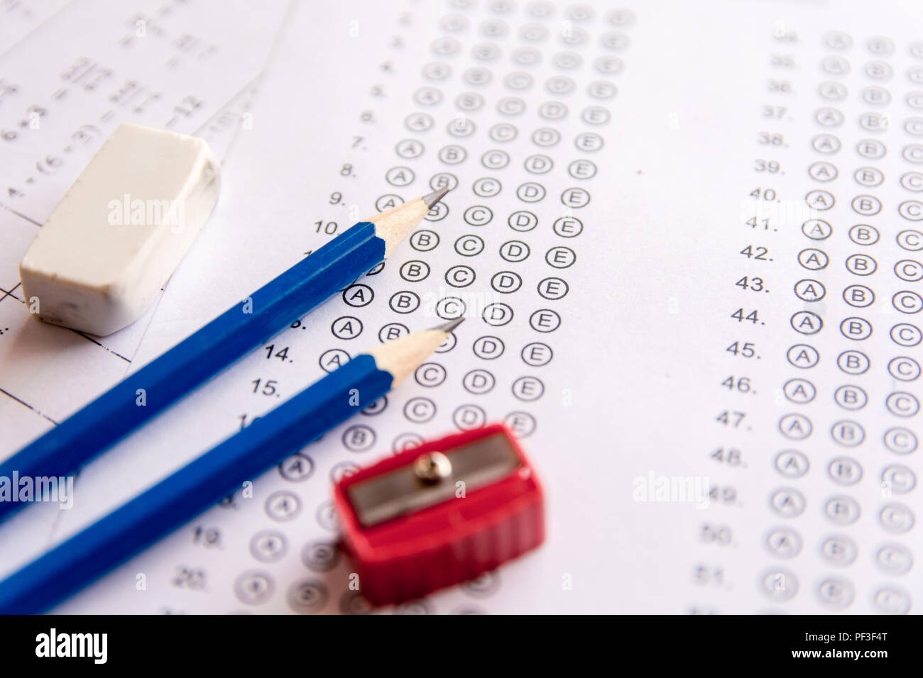 Pencil, Sharpener and eraser on answer sheets or Standardized test form ...