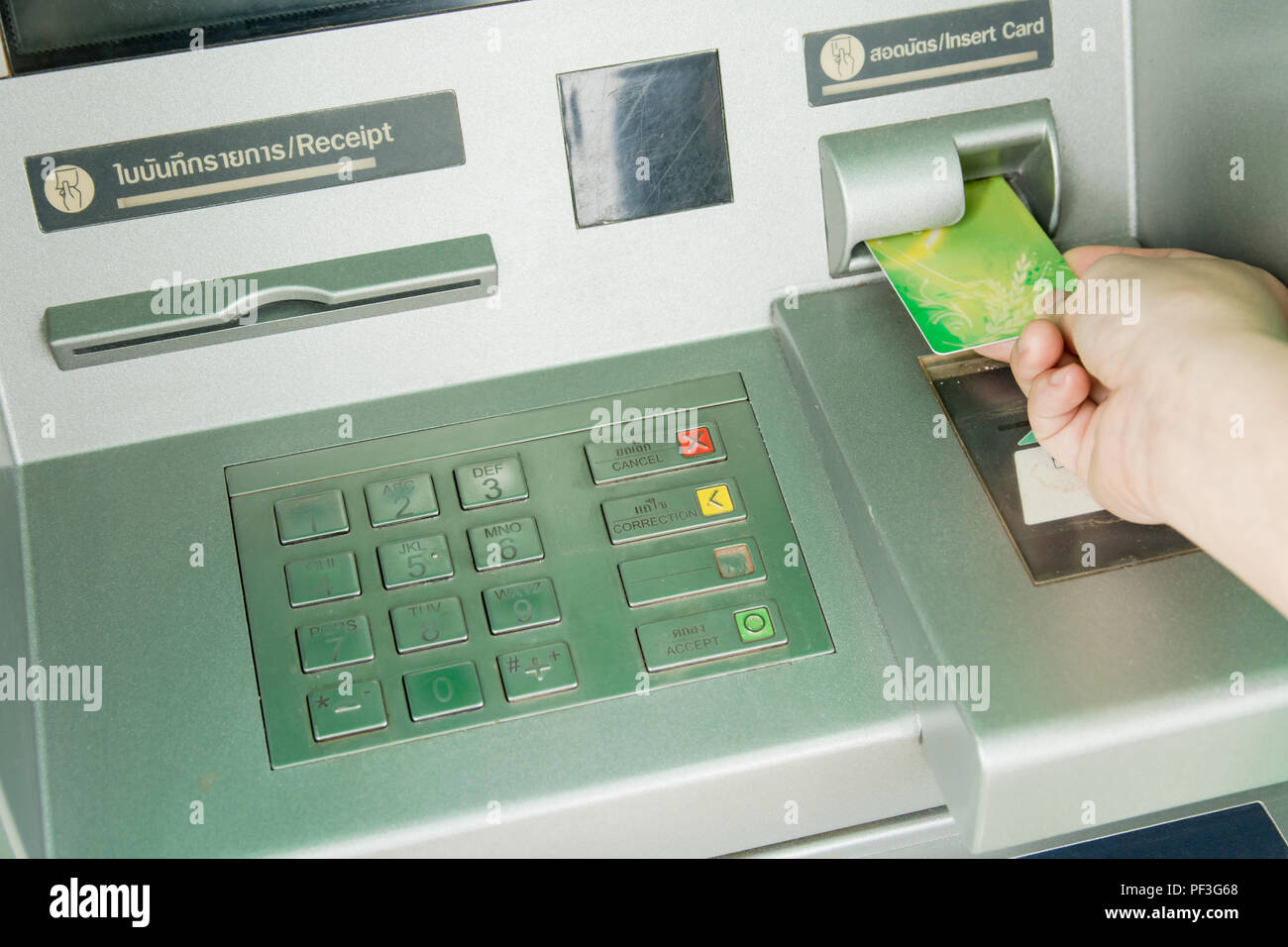 Woman hand inserting card to atm machine to withdraw money Stock Photo ...