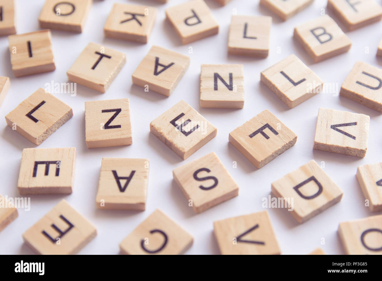 background of letterpress wood type printing blocks, random letters of ...